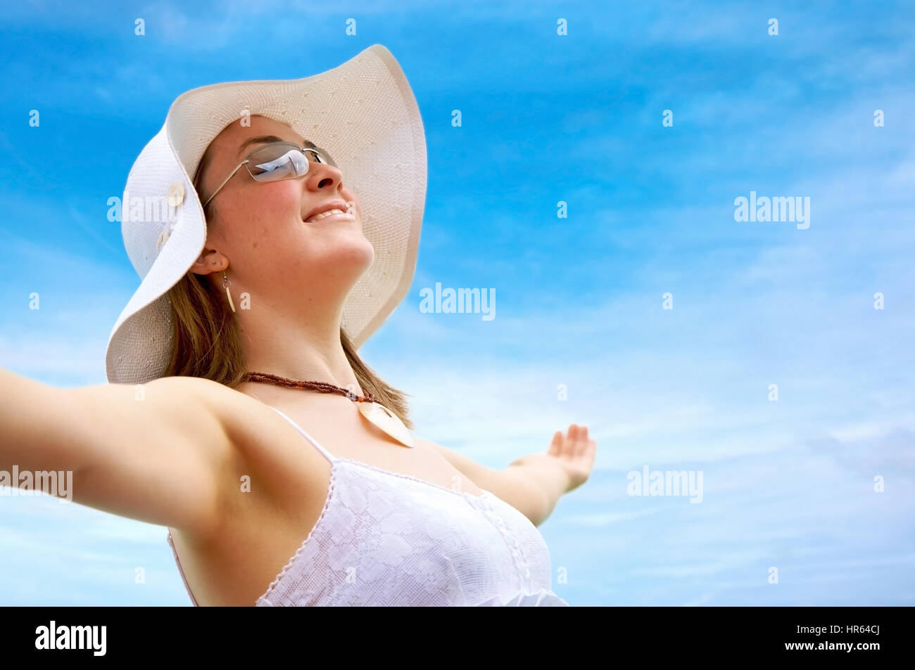 beach freedom woman with arms open having fun in the water Stock Photo - Alamy
