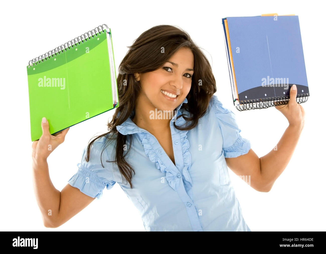 Beautiful girl holding notebooks - isolated over a white background ...