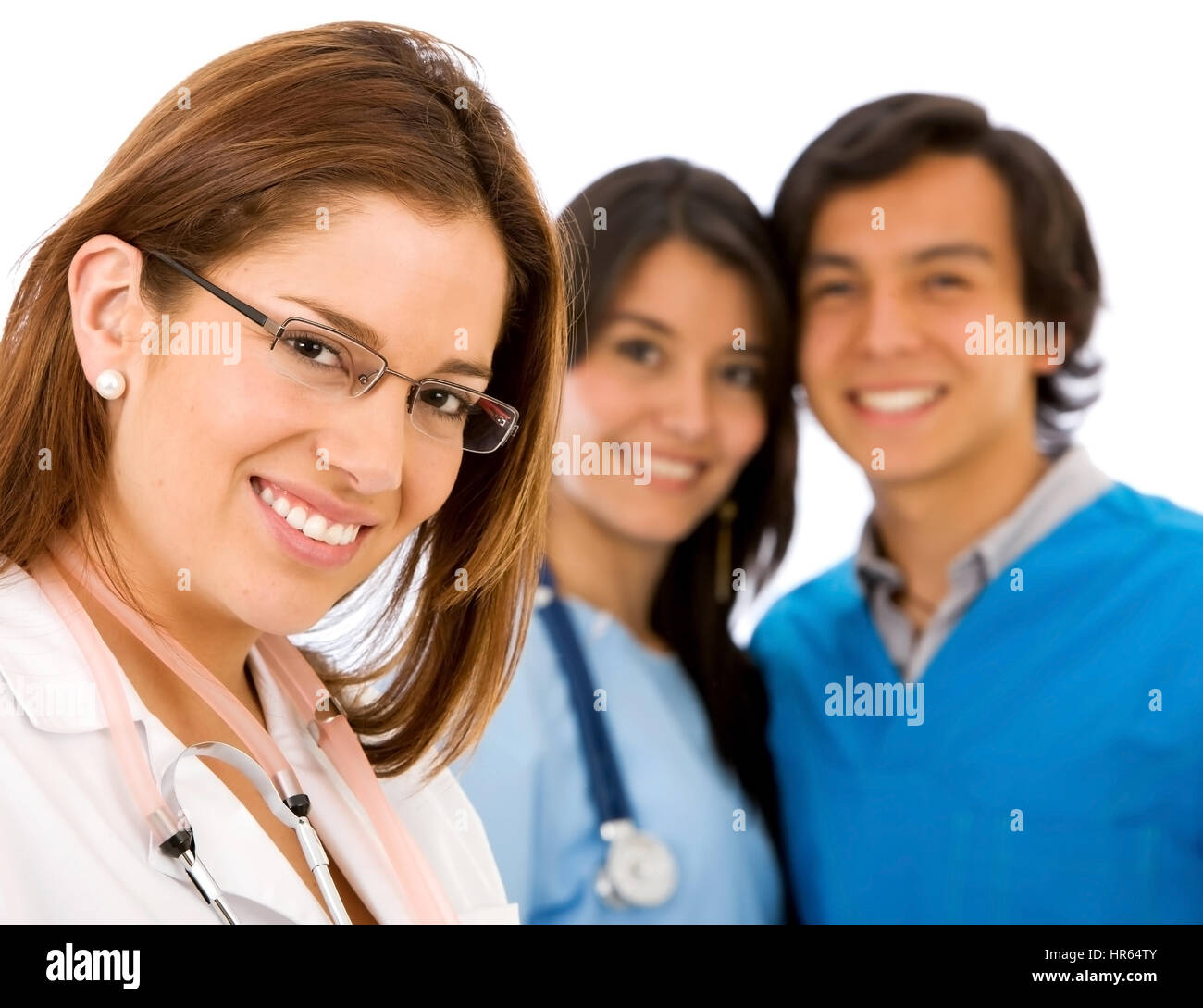 female doctor smiling with her nurse assistants Stock Photo - Alamy