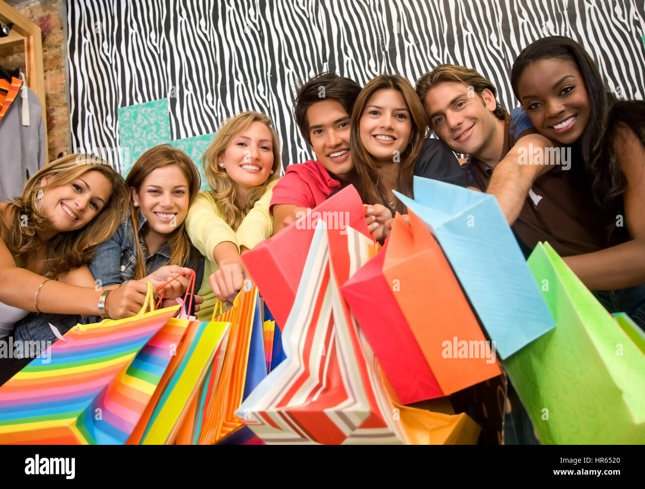 group of friends shopping in a retail store Stock Photo - Alamy
