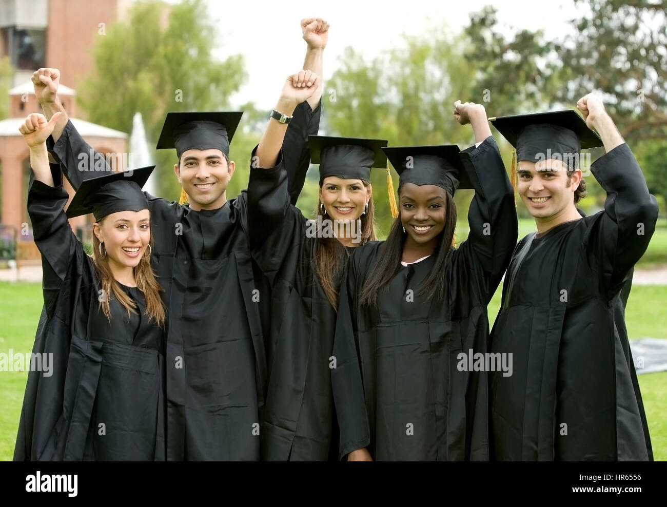 happy graduation student full of success outdoors Stock Photo - Alamy
