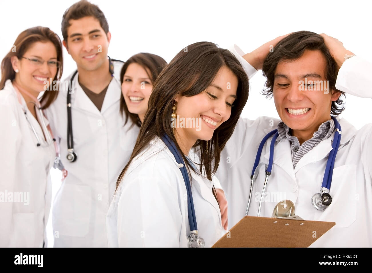 Very happy group of doctors isolated over a white background Stock ...