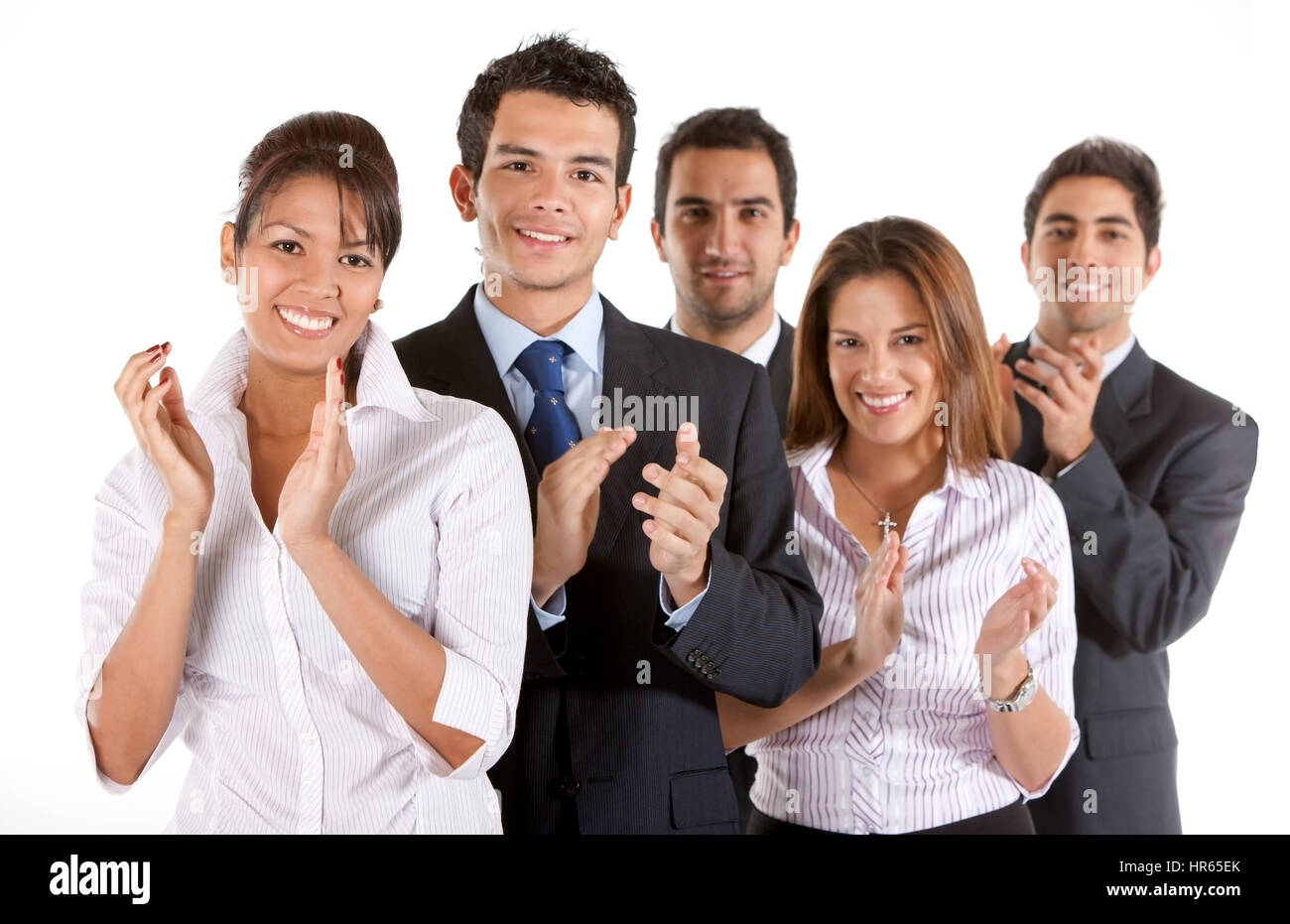 business team clapping and smiling isolated over a white background ...