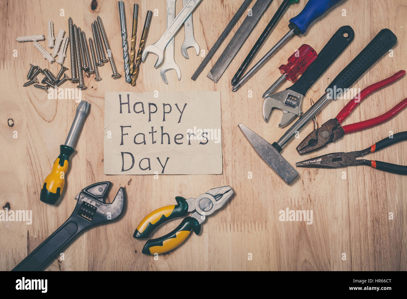 Set of different tools on wooden background. Concept of happy fathers ...