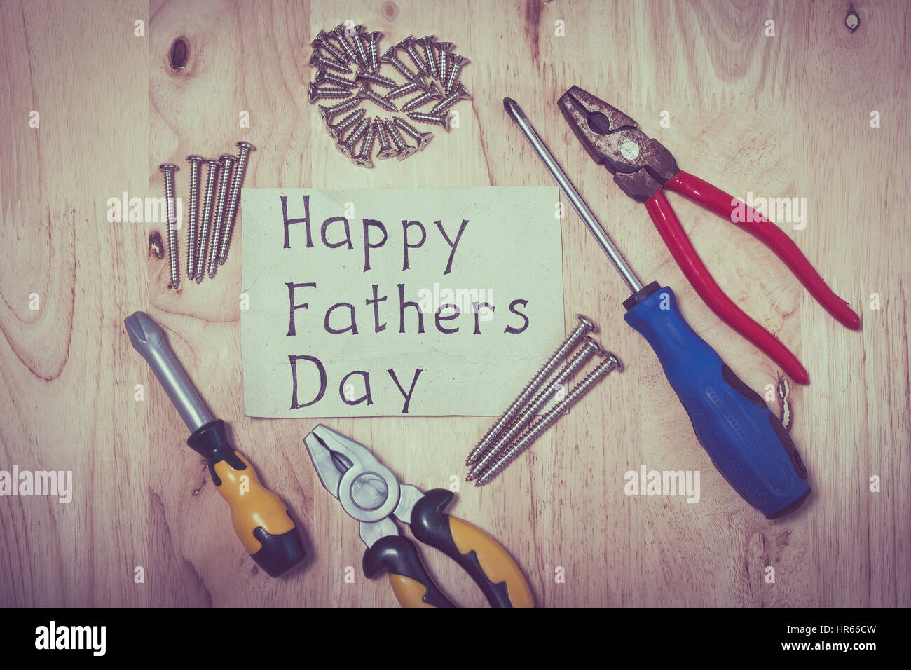 Set of different tools on wooden background. Concept of happy fathers ...