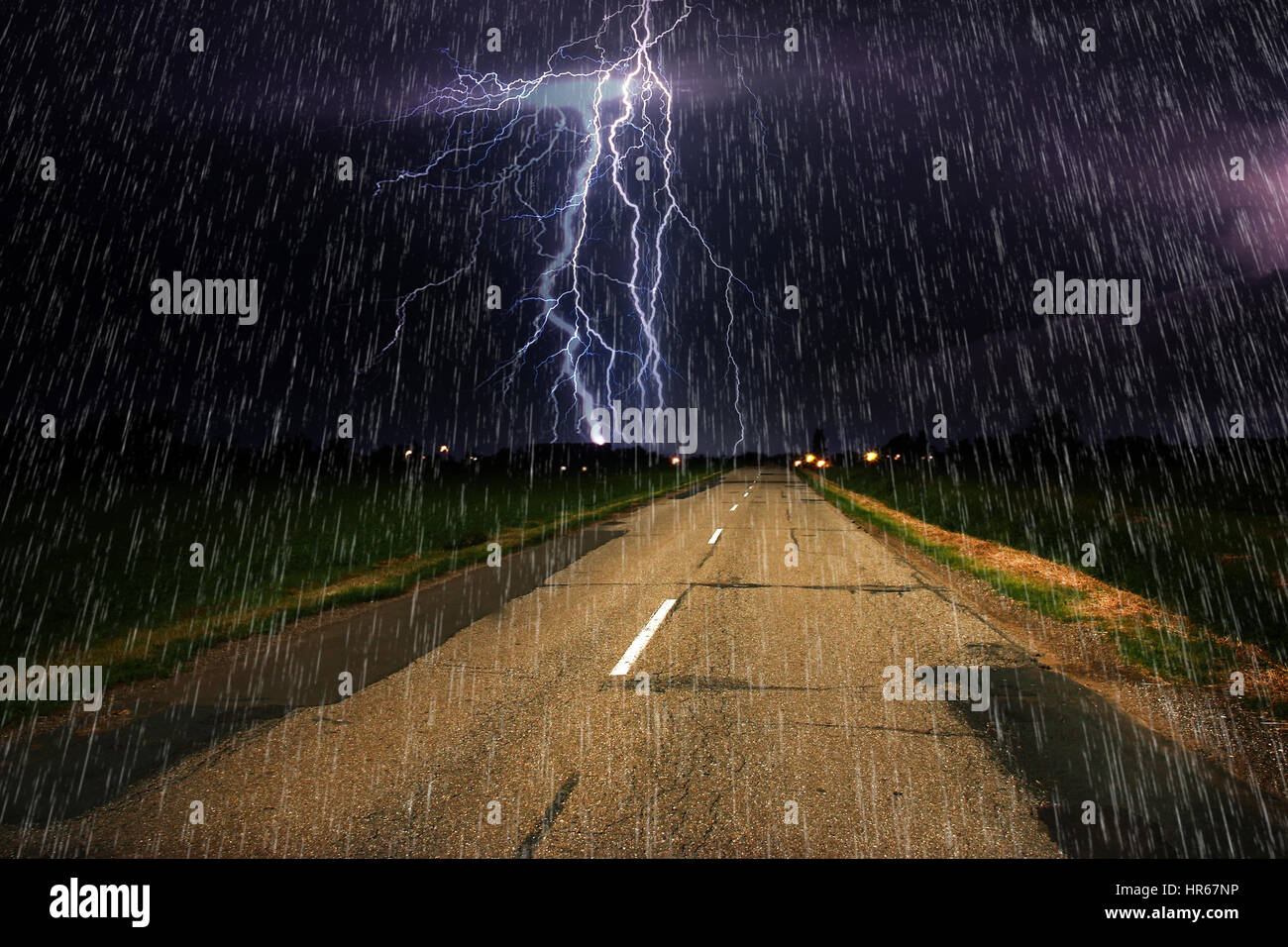 Lightning over asphalt road hi-res stock photography and images - Alamy