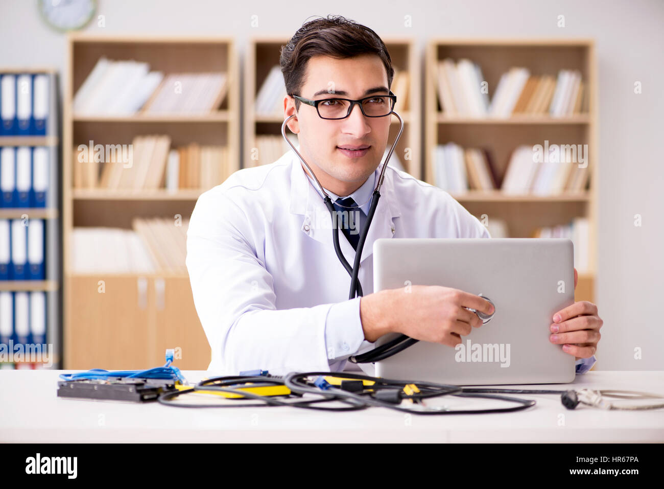 IT technician repairing broken laptop notebook computer Stock Photo - Alamy