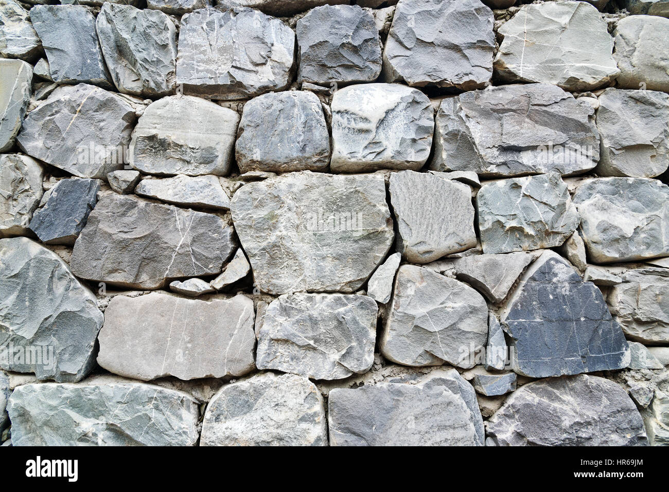 Old grey stone wall background texture Stock Photo - Alamy