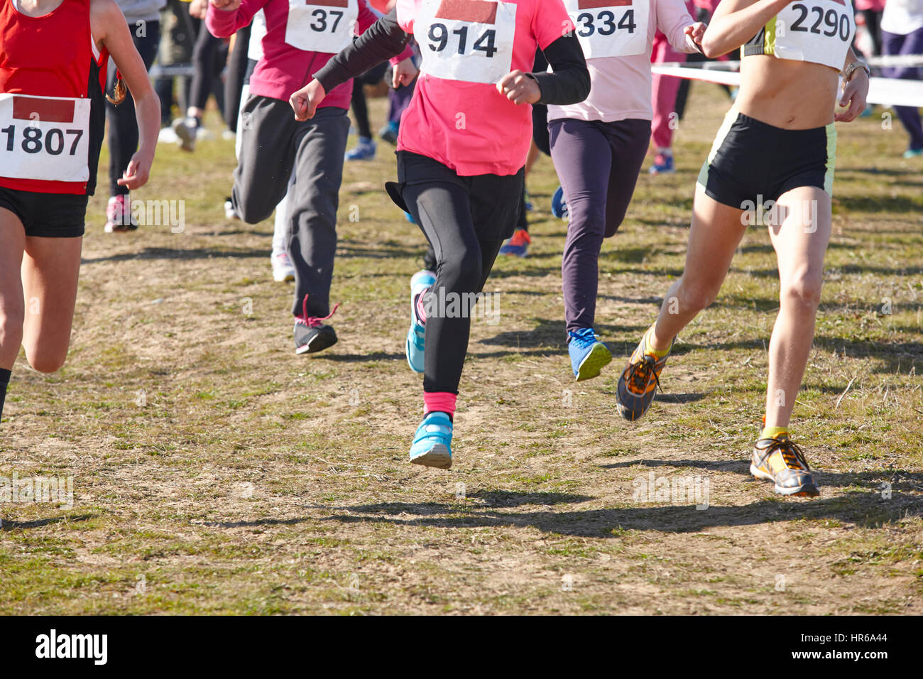 Girls cross country race running hi-res stock photography and images ...