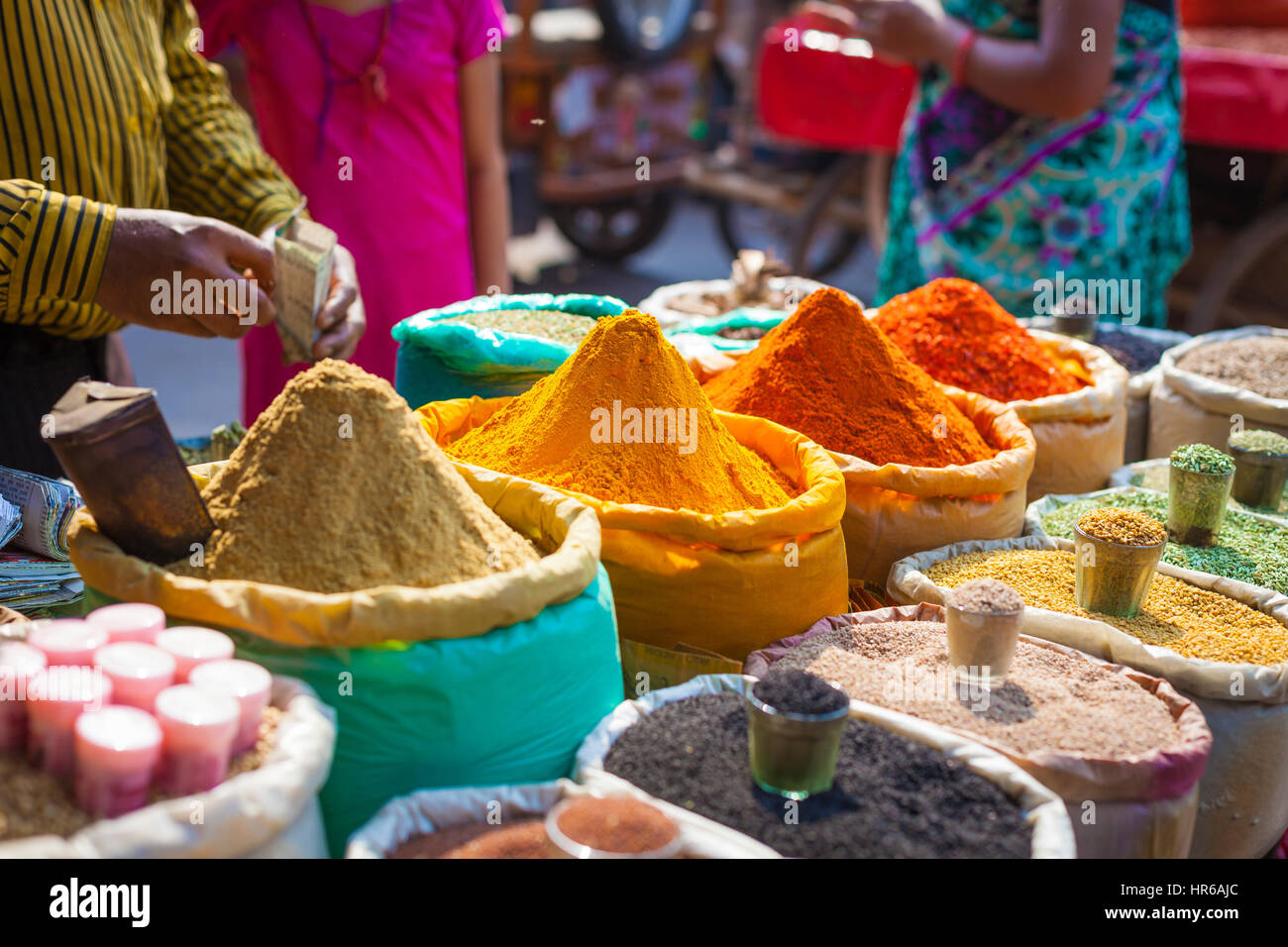 Colorful spices powders and herbs in traditional street market in Delhi ...