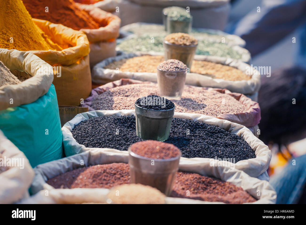 Colorful spices powders and herbs in traditional street market in Delhi ...