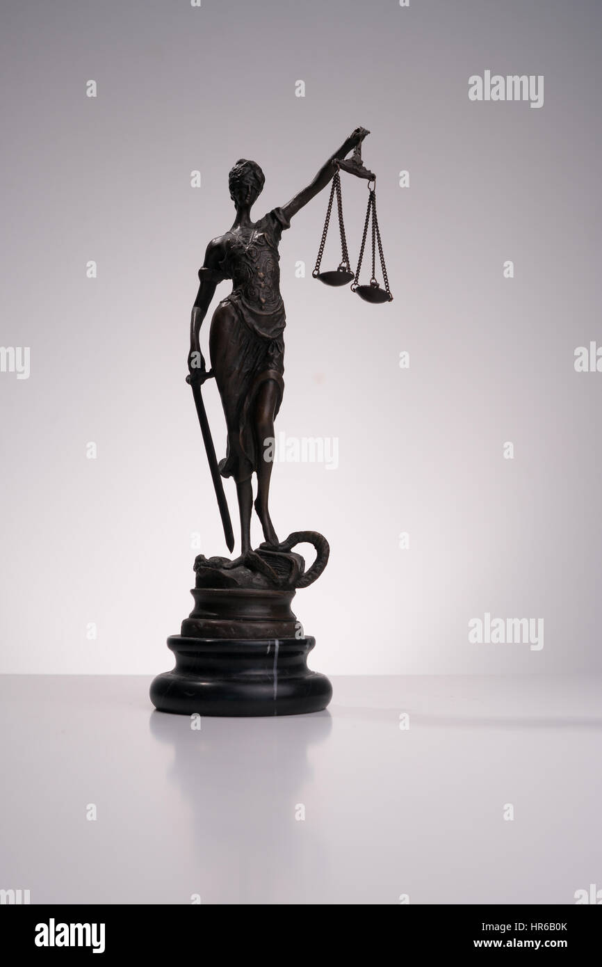 A statue of Themis on white background Stock Photo - Alamy