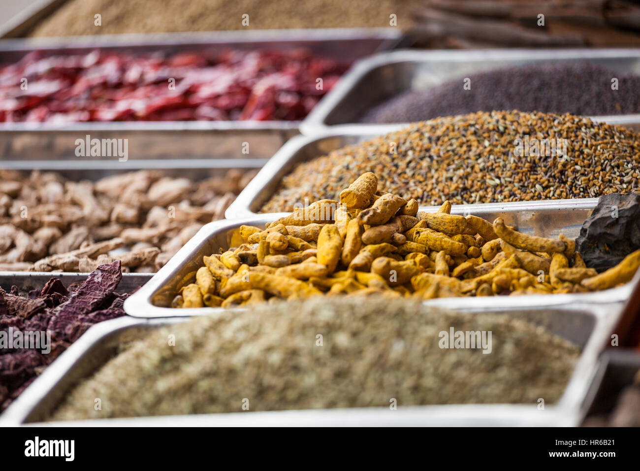 Colorful spices powders and herbs in traditional street market in Delhi ...