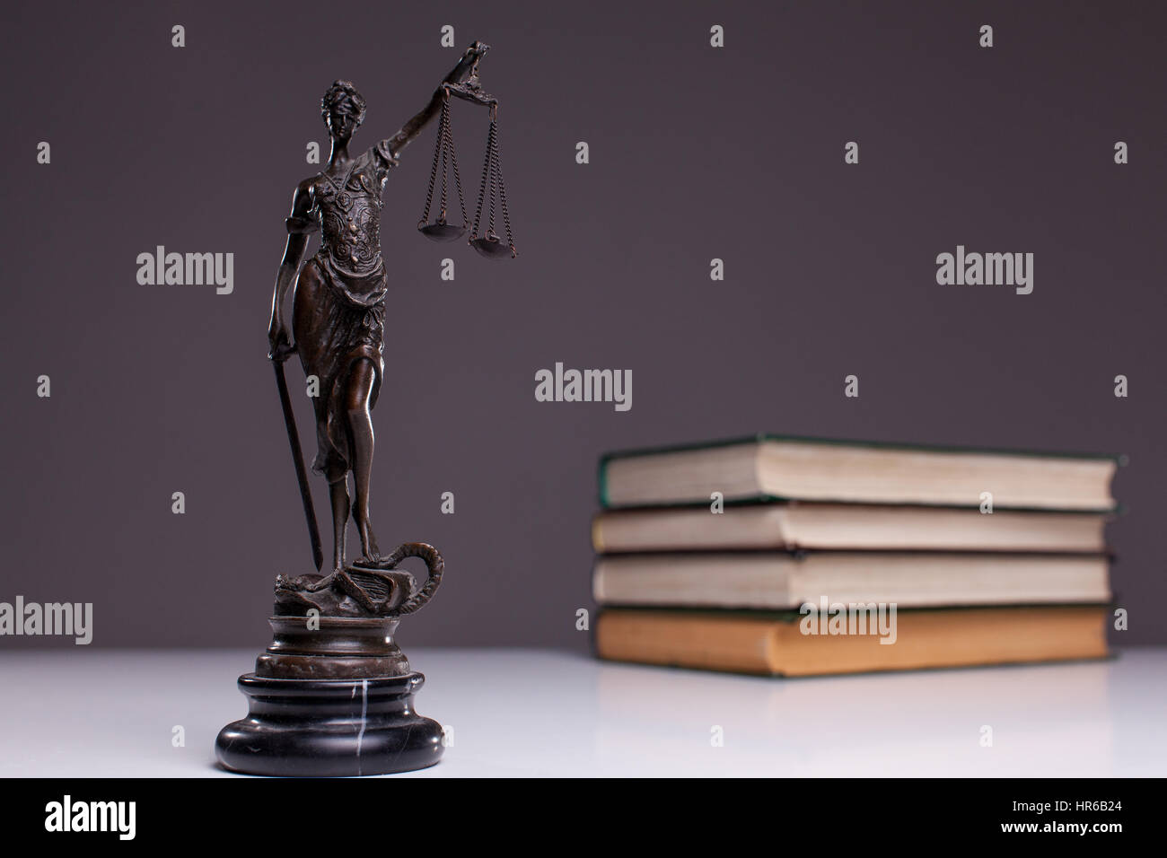 Lady justice statue law table hi-res stock photography and images - Alamy