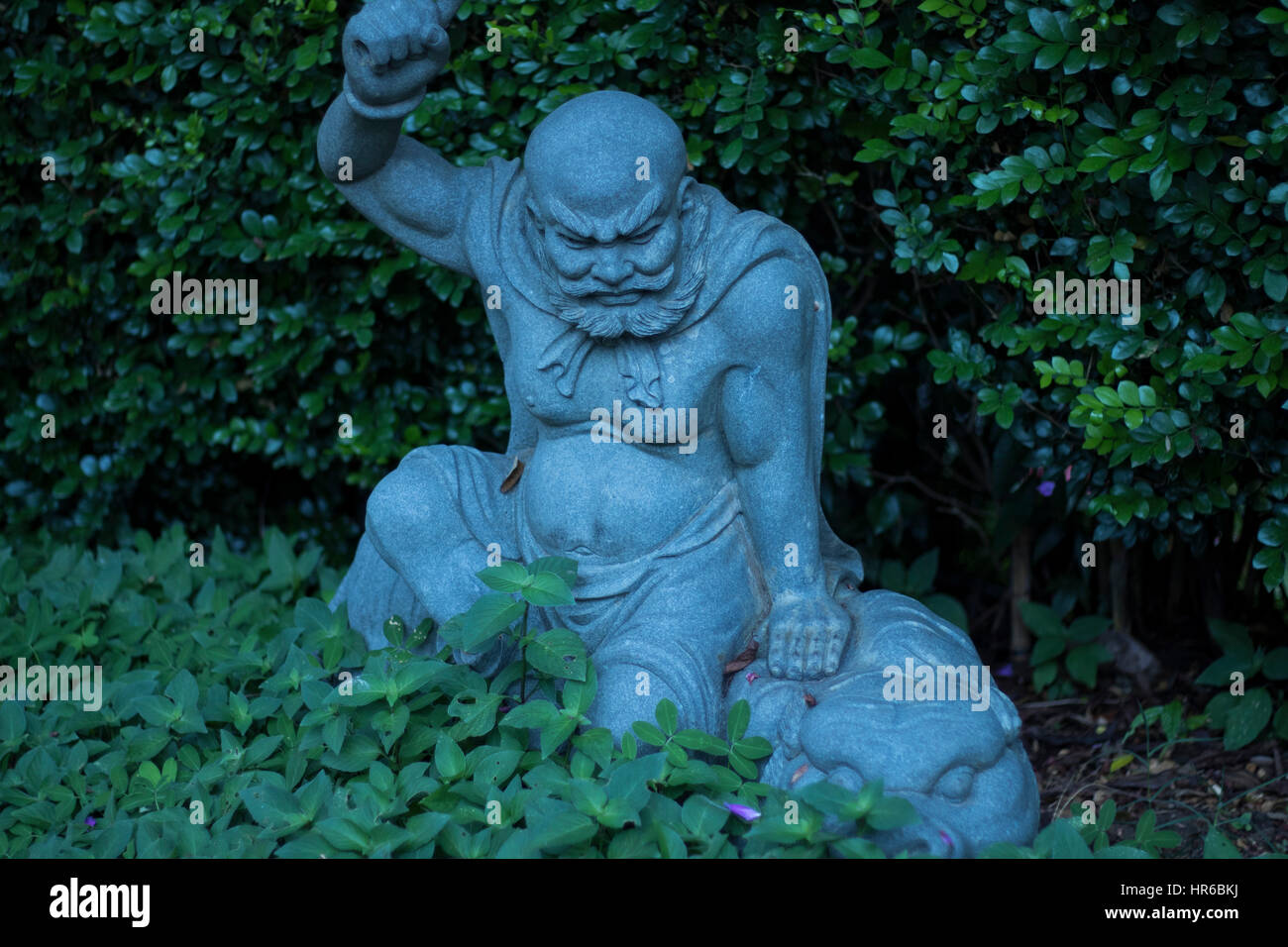 Buddhist Stone Statues Stock Photo - Alamy