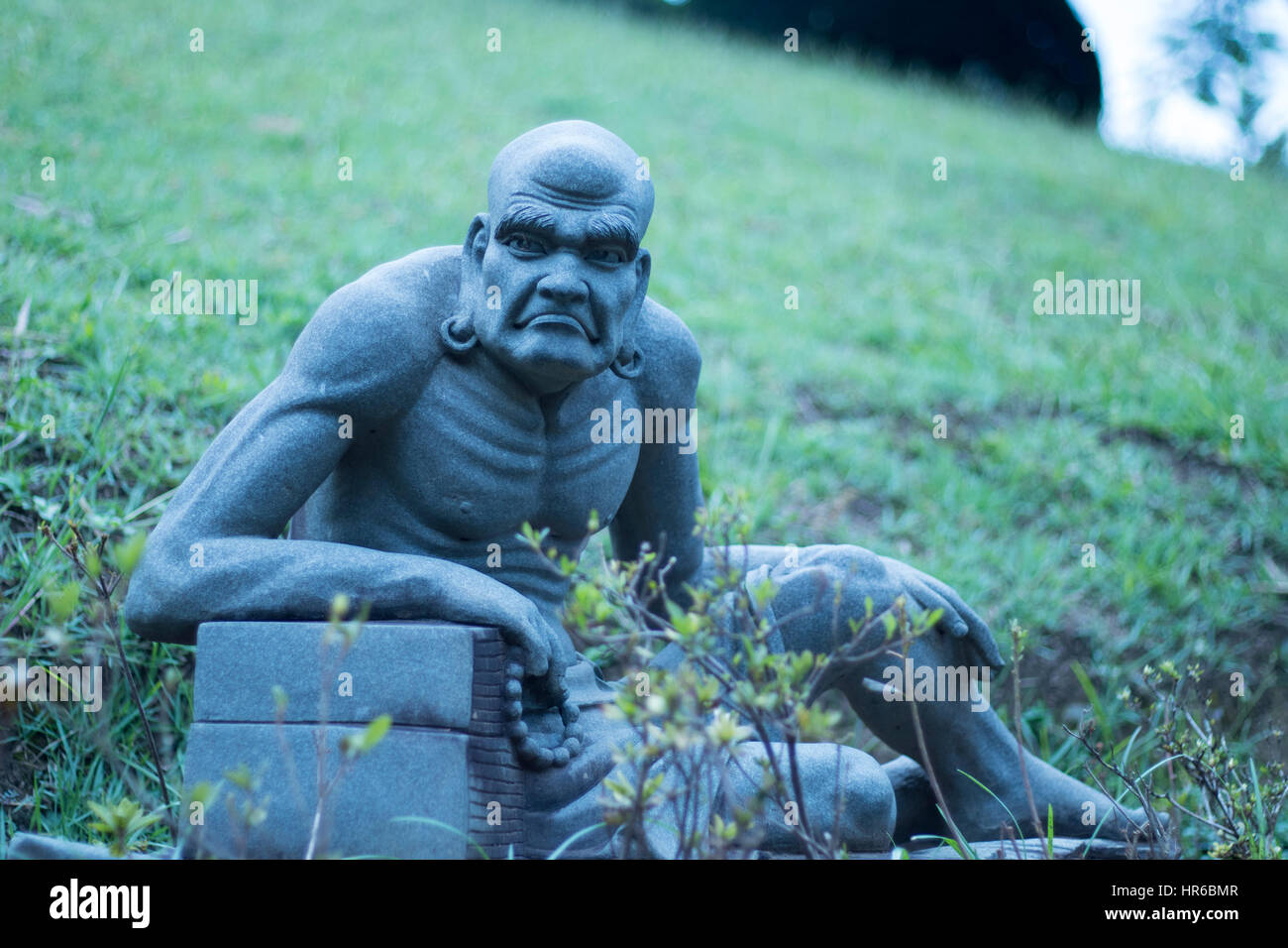 Buddhist Stone Statues Stock Photo - Alamy