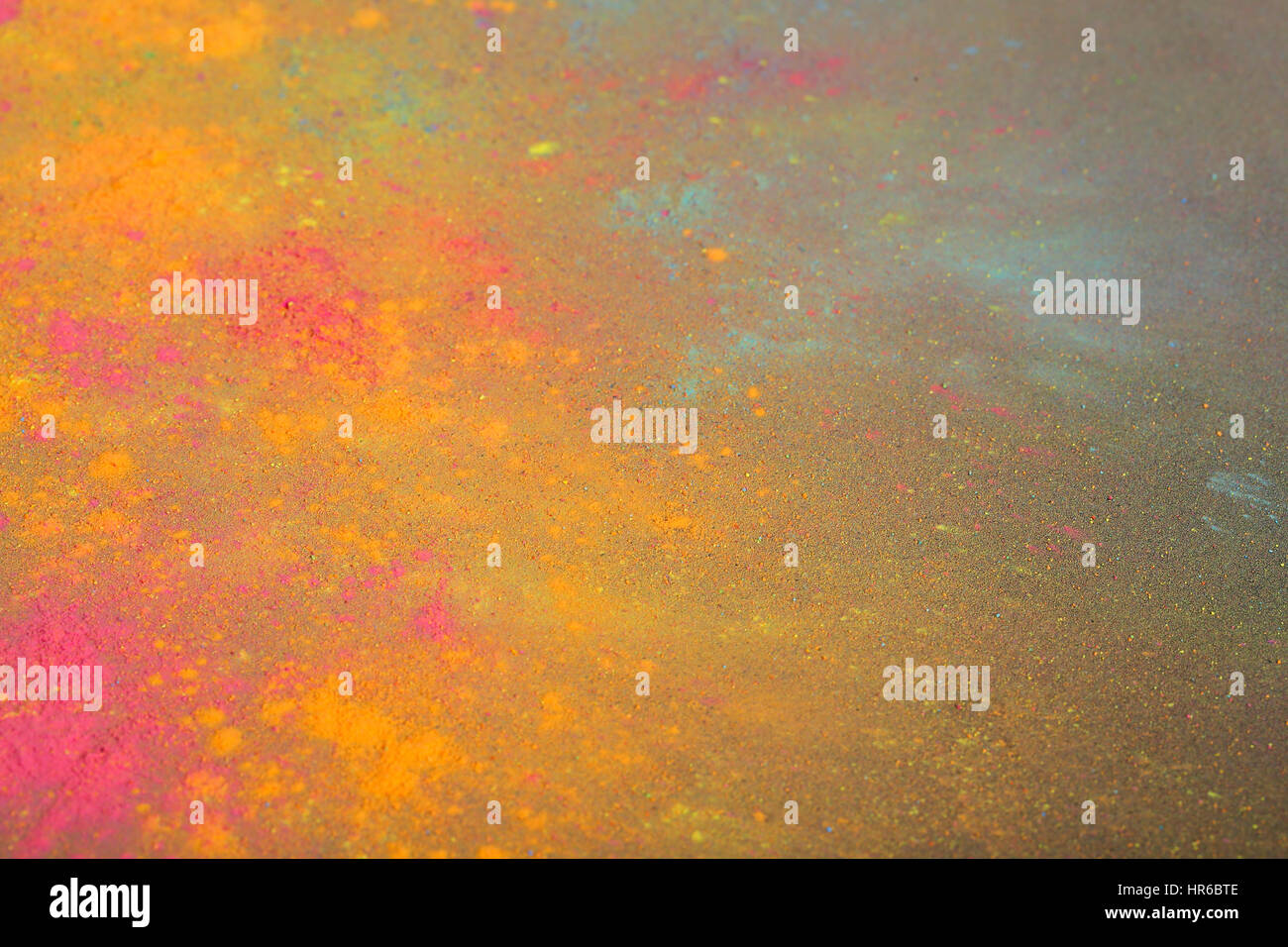 Holi colours on black background Stock Photo - Alamy