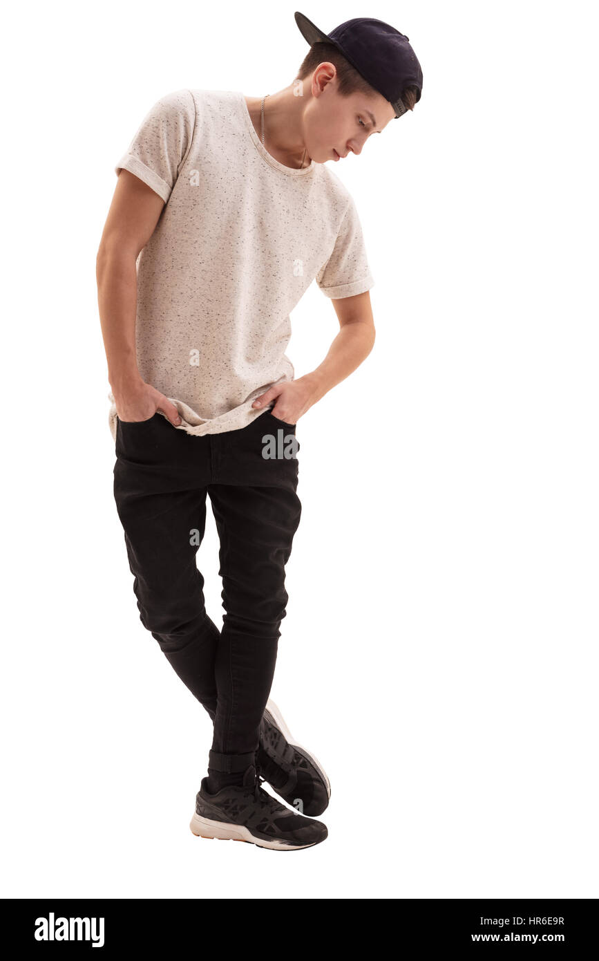 Young handsome rap dancer in black baseball cap posing in studio Stock ...