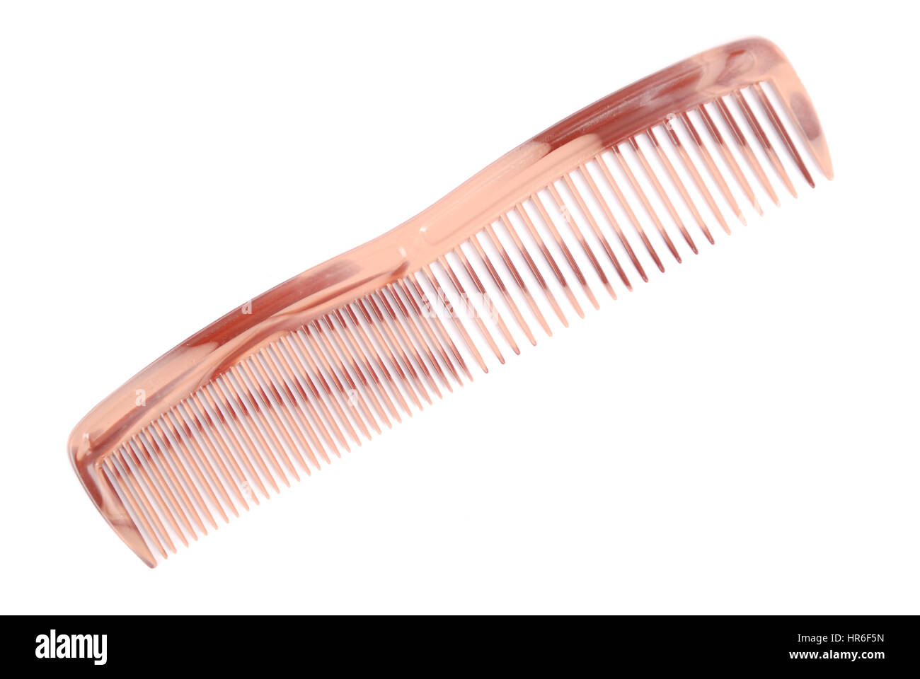 Brown plastic hair comb isolated on white background Stock Photo - Alamy