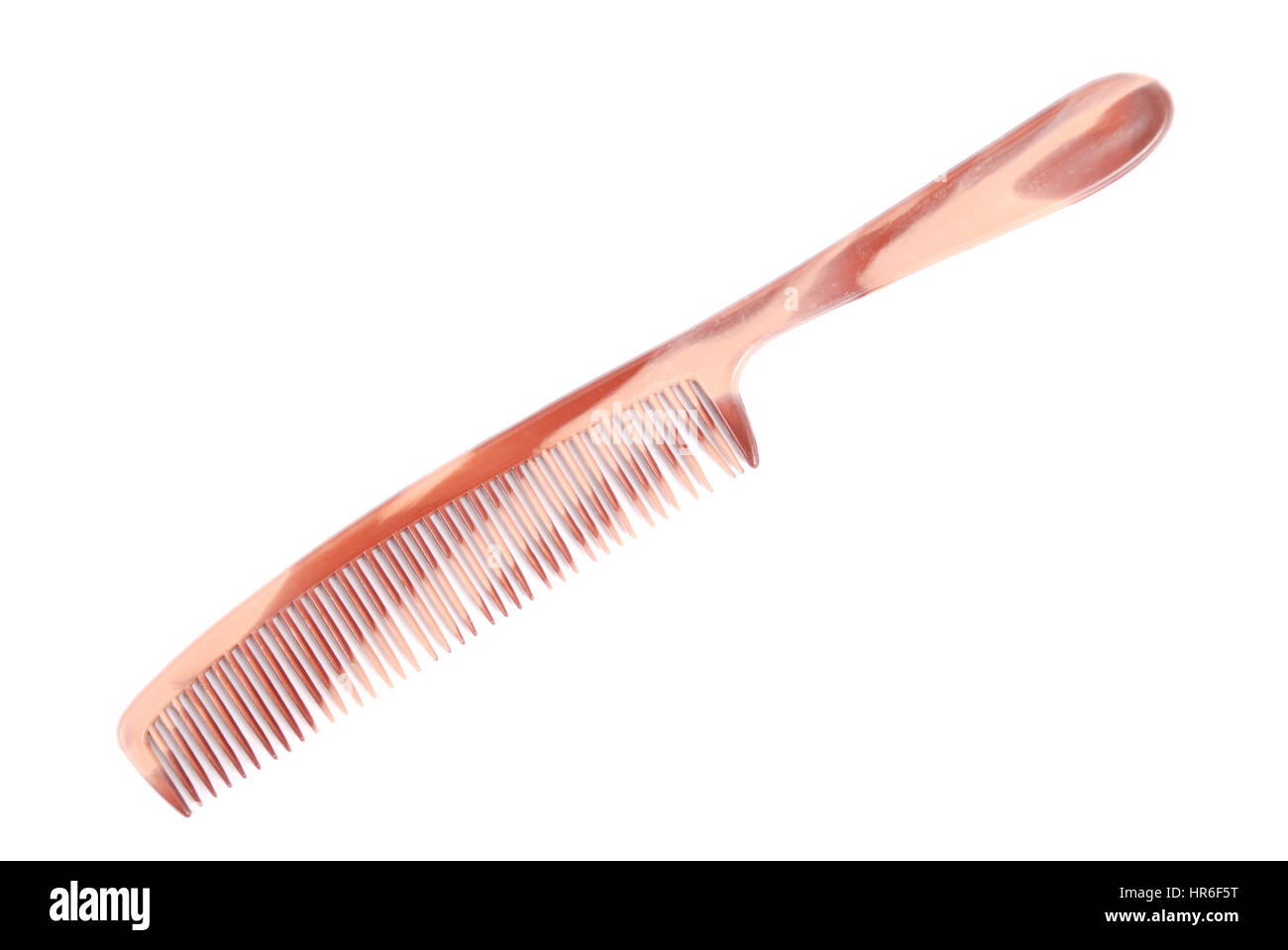 Brown plastic hair comb isolated on white background Stock Photo - Alamy