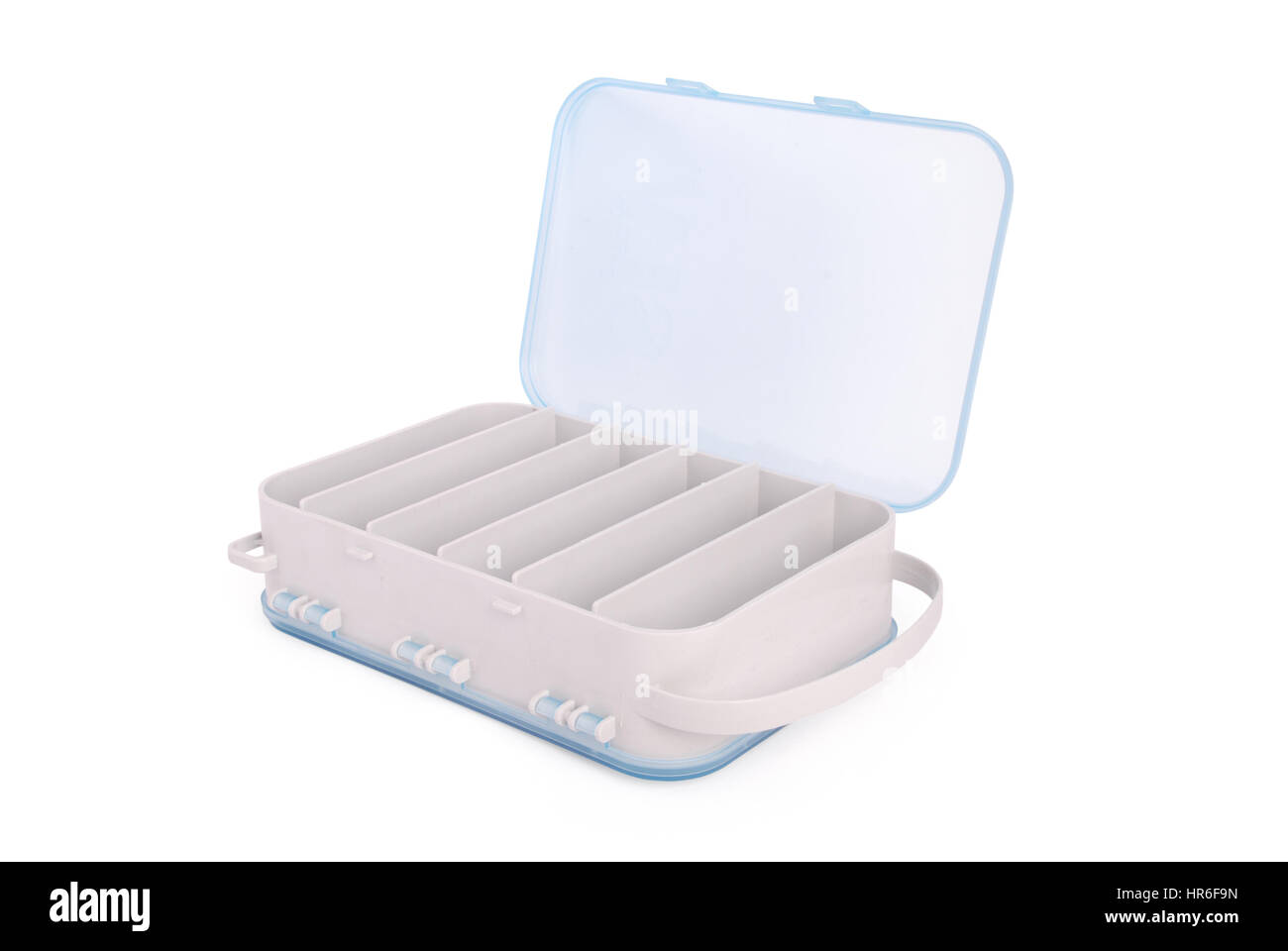 Opened white plastic box for fishing tackle on an isolated white ...