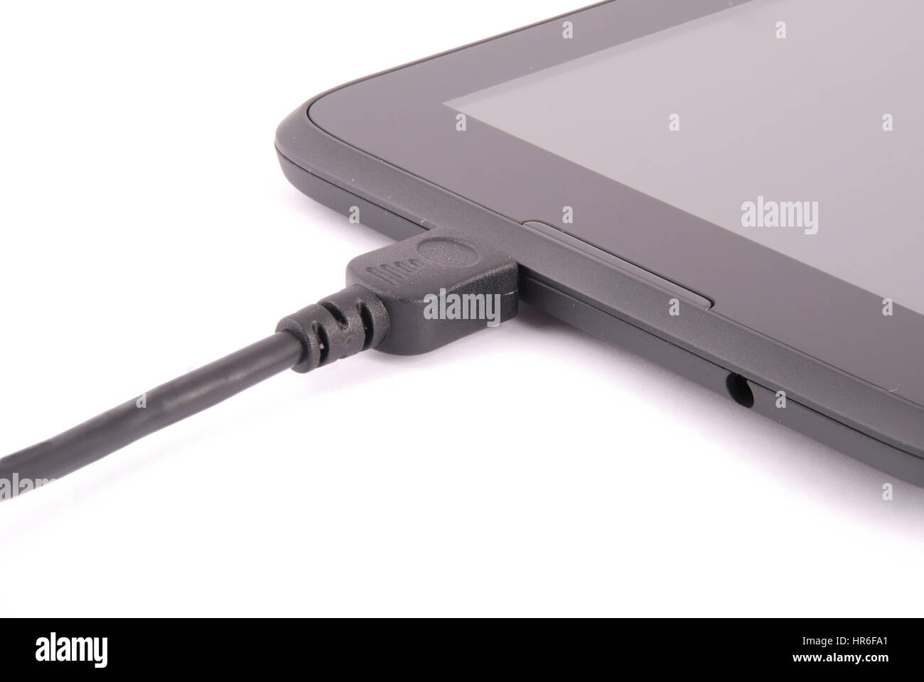 Charging devices and tablet pc isolated white background with soft ...