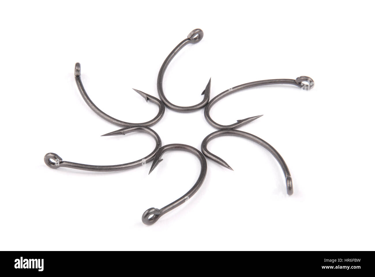 Sharp steel fishing hooks isolated on white background with soft shadow ...