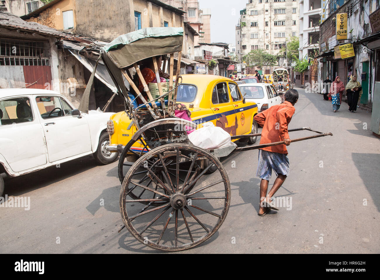 Human,pulled,rickshaw,City of Joy,traffic,congestion,Ambassador,yellow ...