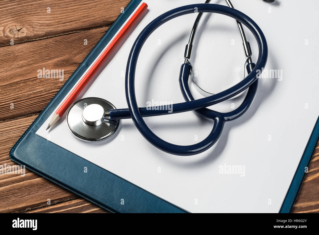 Desk of doctor with medicine things Stock Photo - Alamy