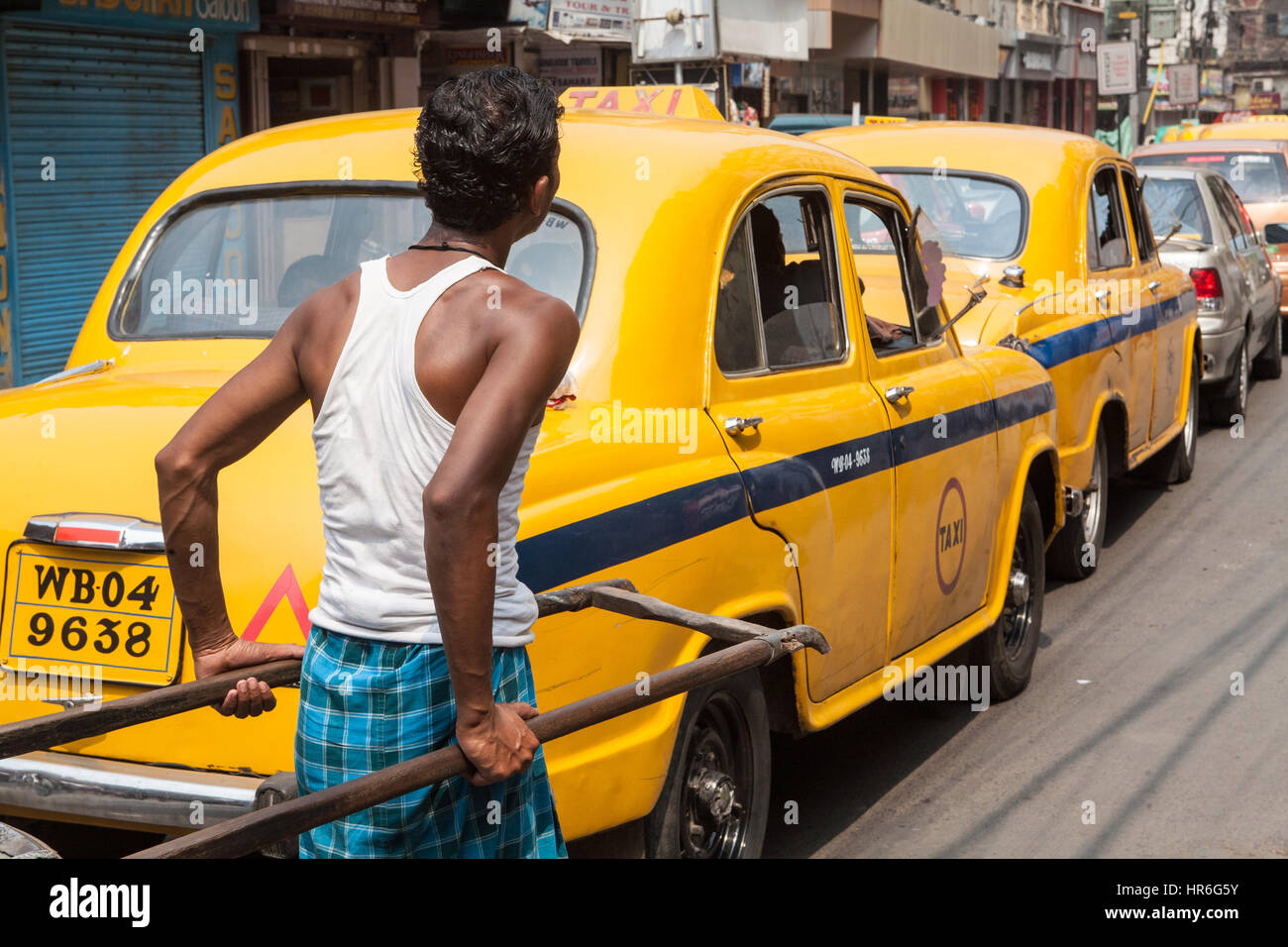 Human,pulled,rickshaw,City of Joy,traffic,congestion,Ambassador,yellow ...
