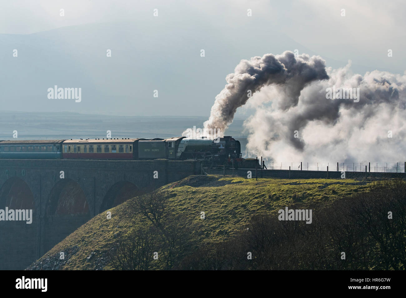 Steam train pulling passenger coaches hi-res stock photography and ...