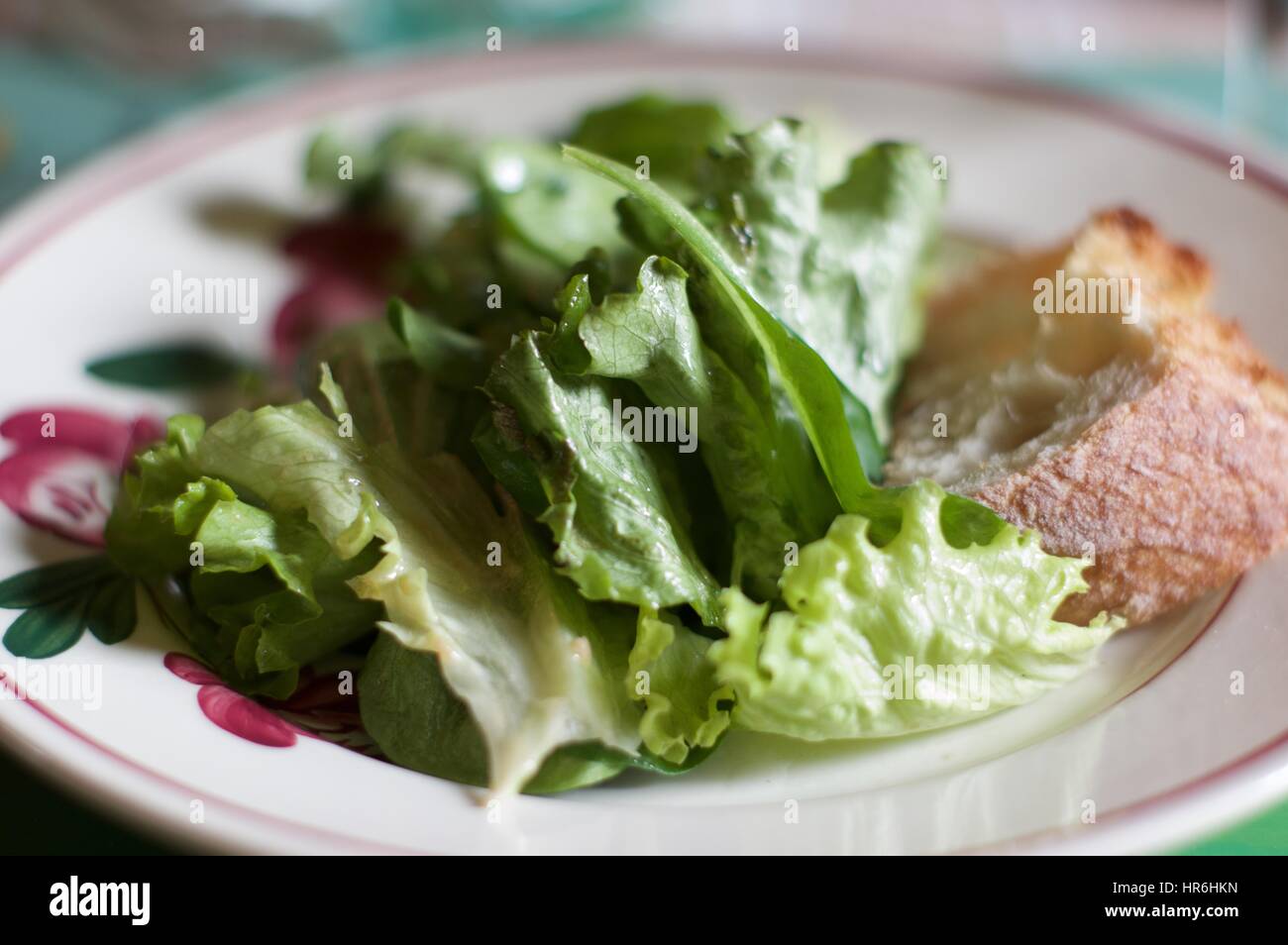 A small plate of salad and bread Stock Photo - Alamy