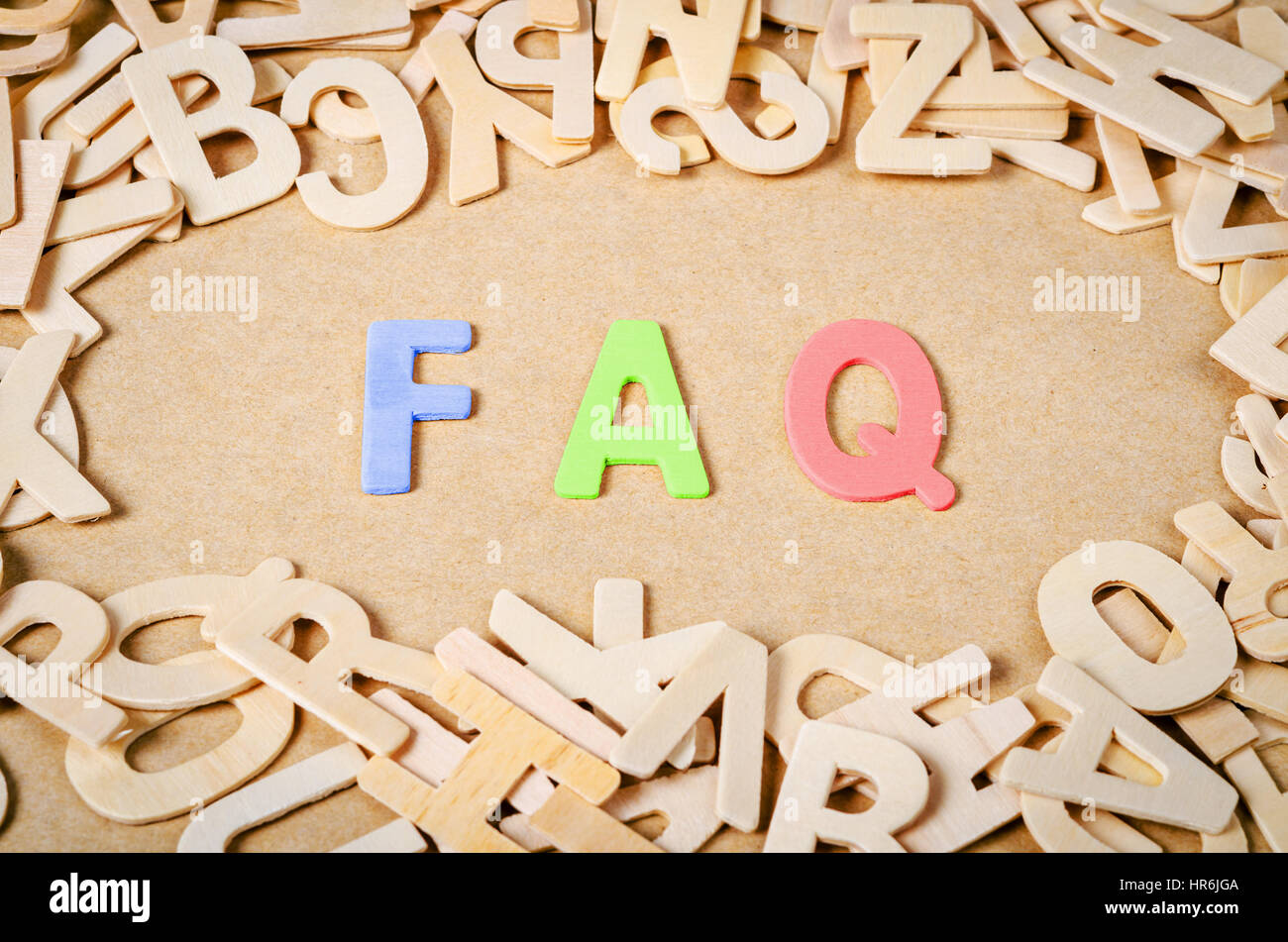 wood letters as FAQ abbreviation, frequently asked questions on wooden ...