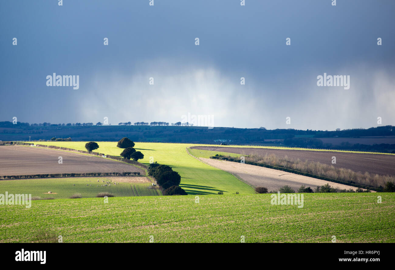 Heavy rain and hail showers over the Wessex countryside and farmland at ...