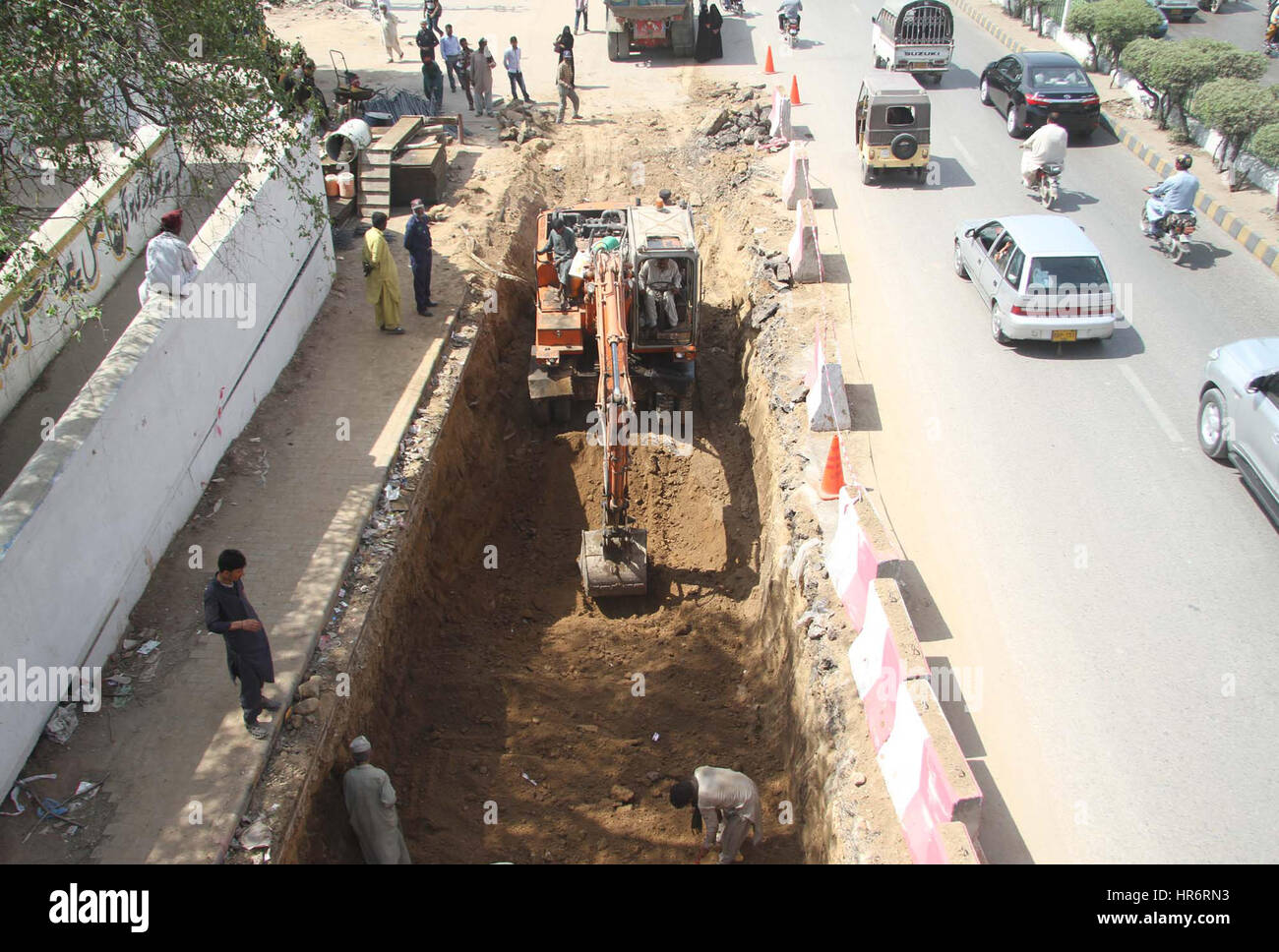 Pakistan. 27th Feb, 2017. Construction work of rain drain is underway ...