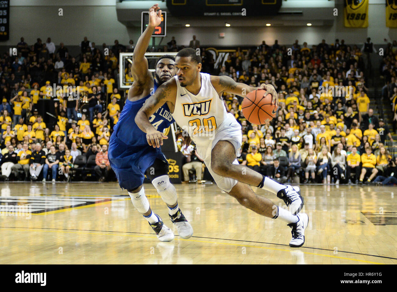 February 22, 2017 - JORDAN BURESS (20) drives around AARON HINES (24 ...