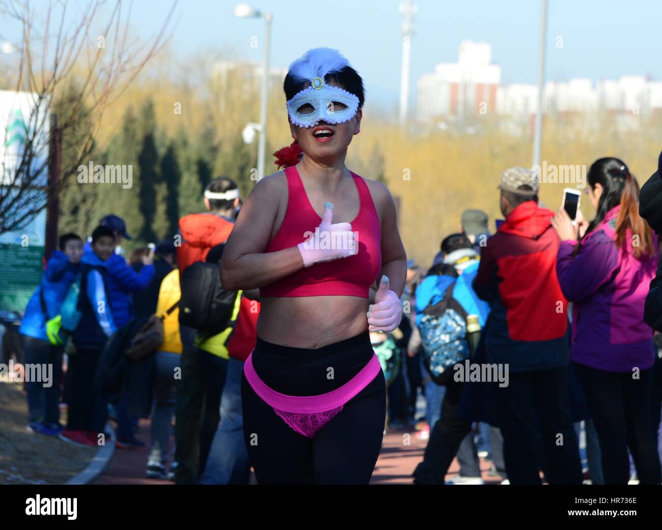 Beijing, Beijing, China. 26th Feb, 2017. Runners dress themselves up in ...