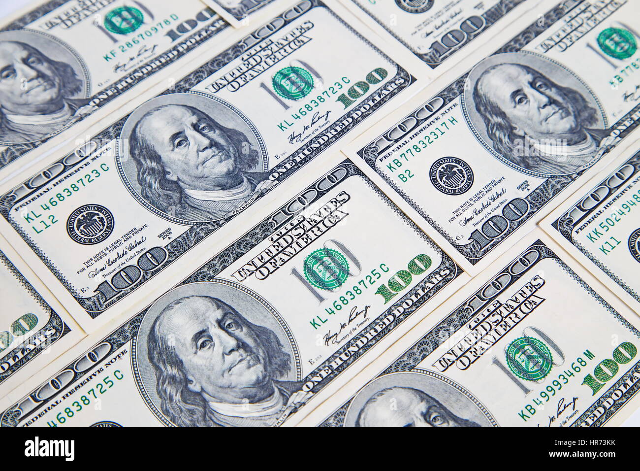 Background from a variety of hundred-dollar bills. Many money. Dollars ...