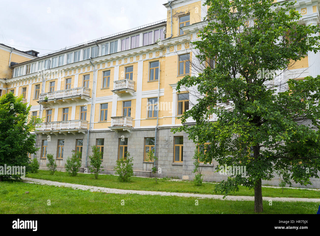 Old yellow building in the city centre Stock Photo - Alamy