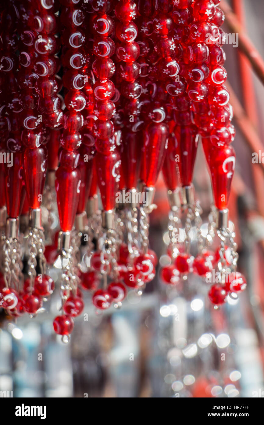 Red color beads with crescent and star shapes Stock Photo - Alamy