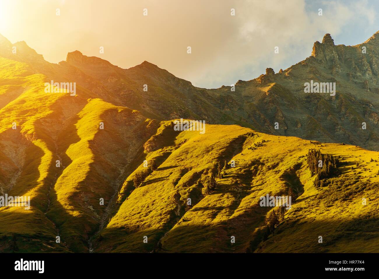 Alpine Mountain Sunset. Scenic Mountain Range During Golden Sunset ...