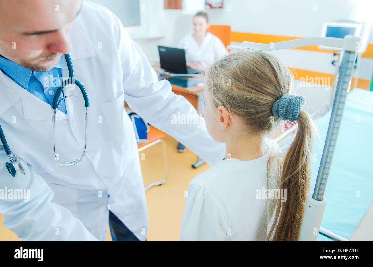 Children Health Check. Doctor Measuring Little Caucasian Girl in His ...
