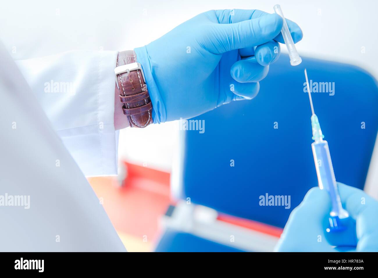 Preparing Syringe For Vaccination in the Doctor Office Stock Photo - Alamy