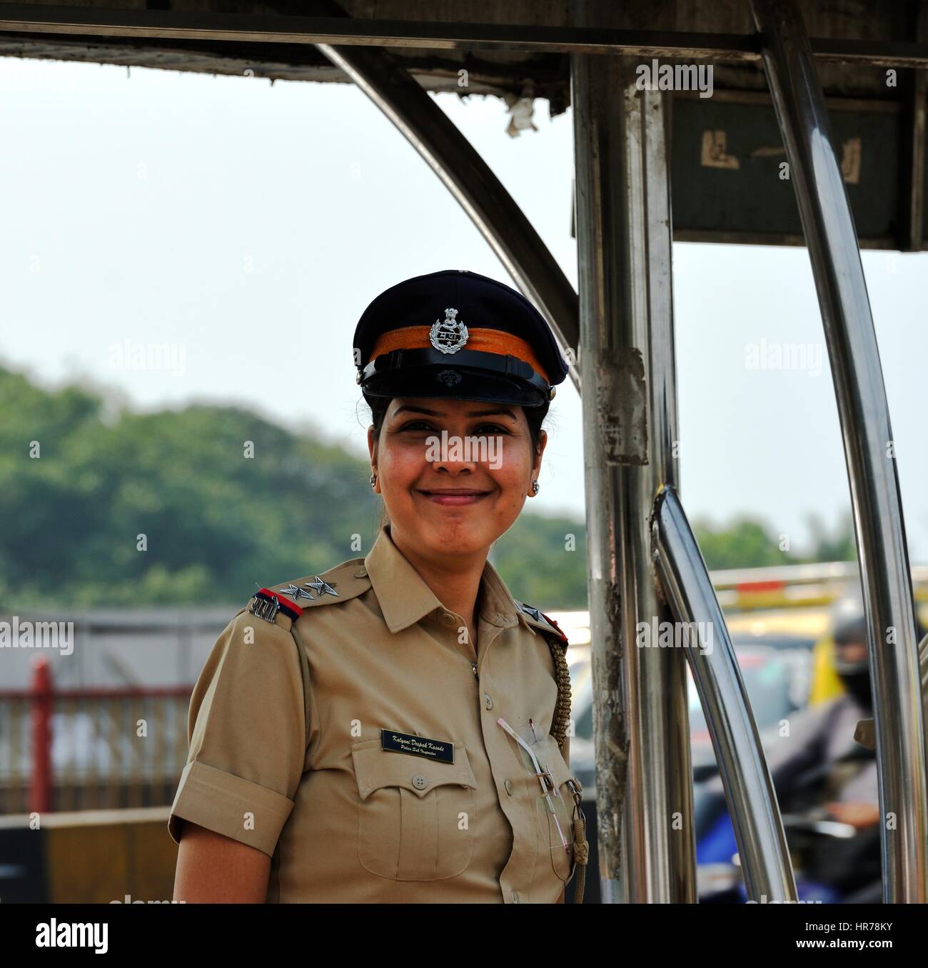 Smiling Security Lady on duty Stock Photo - Alamy