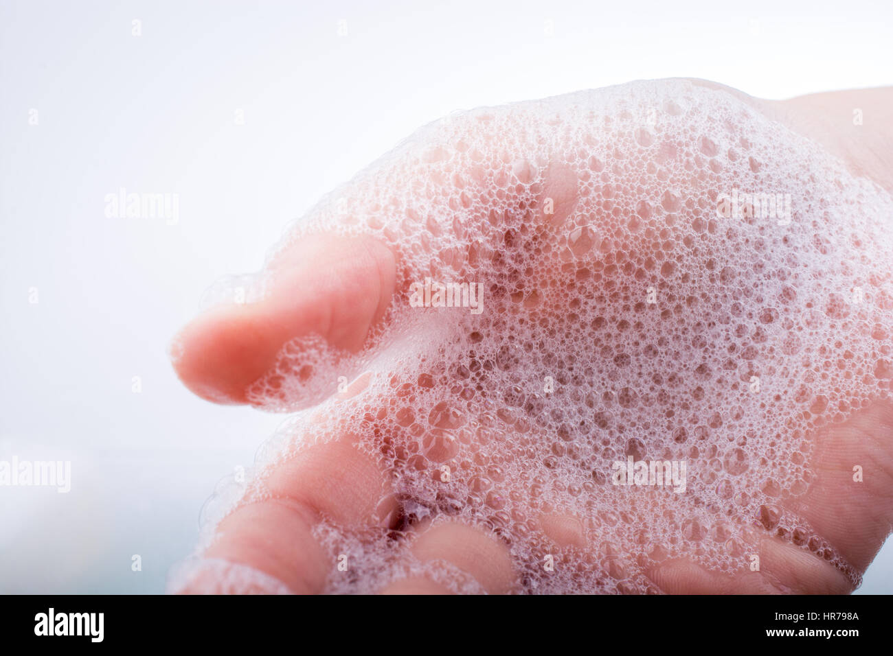 Hand washing and soap foam on a foamy background Stock Photo - Alamy