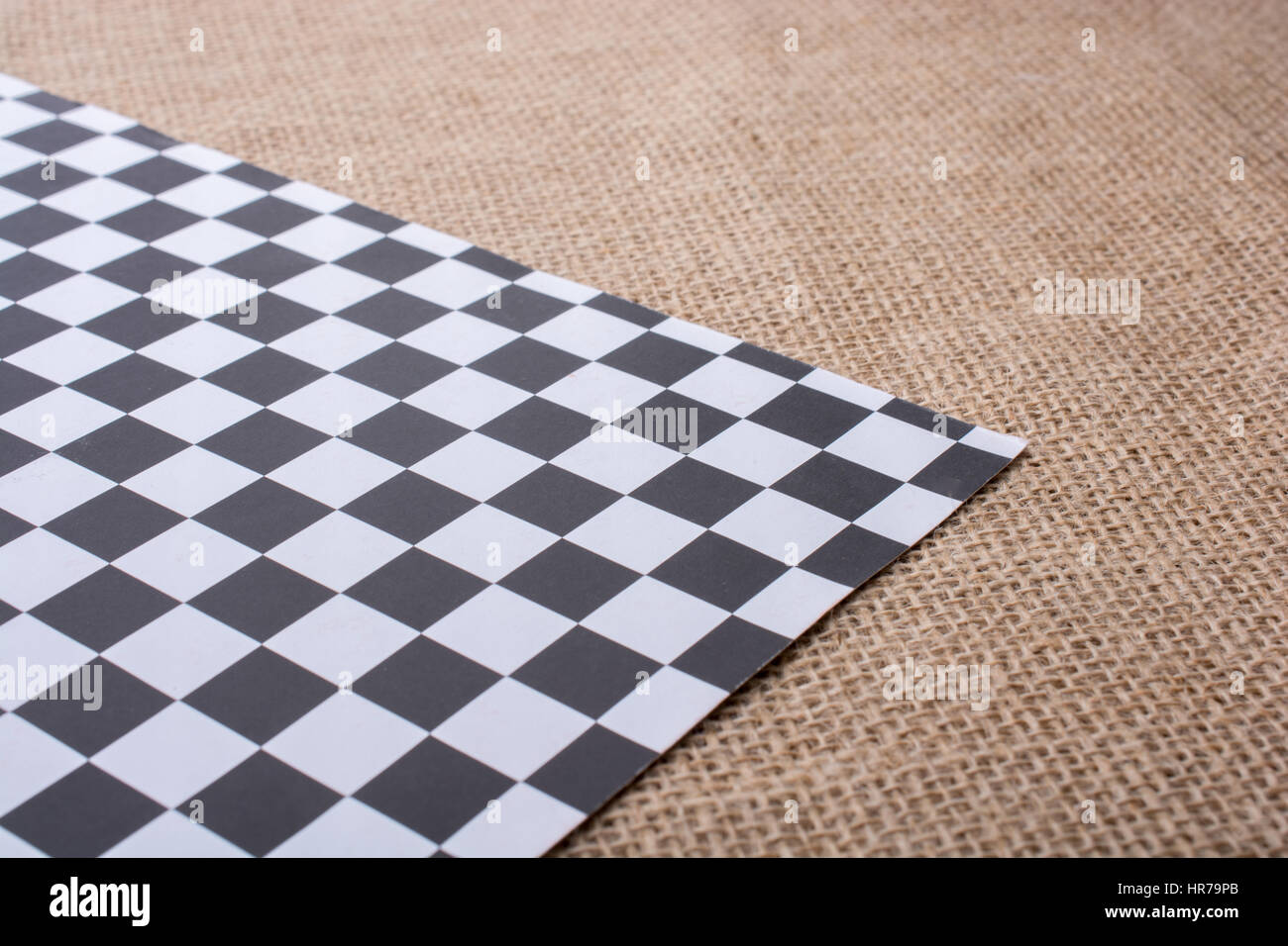 Piece of checked paper on a linen canvas Stock Photo - Alamy