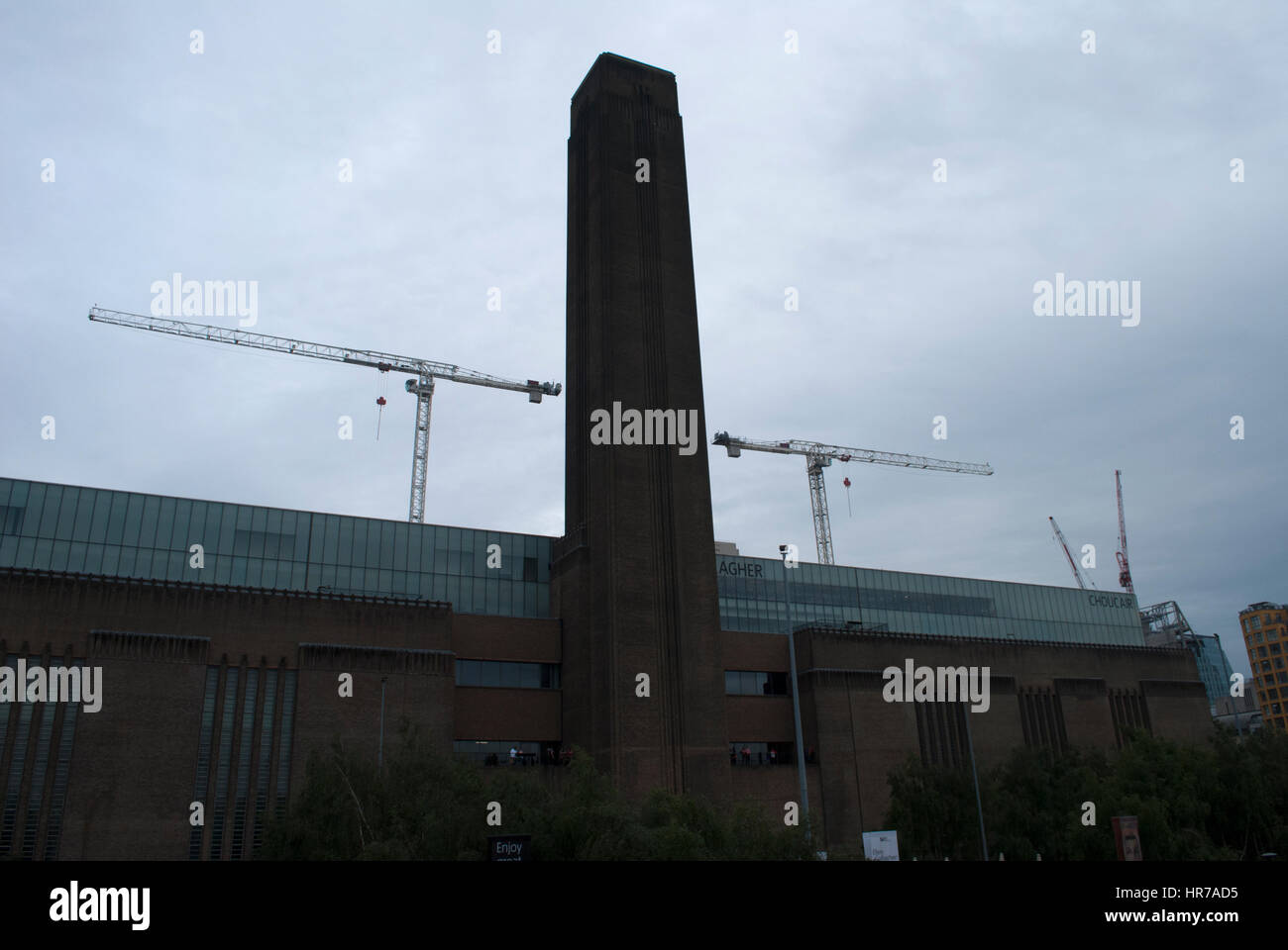 Dark central tower of Tate Modern art gallery, flanked by two tower ...