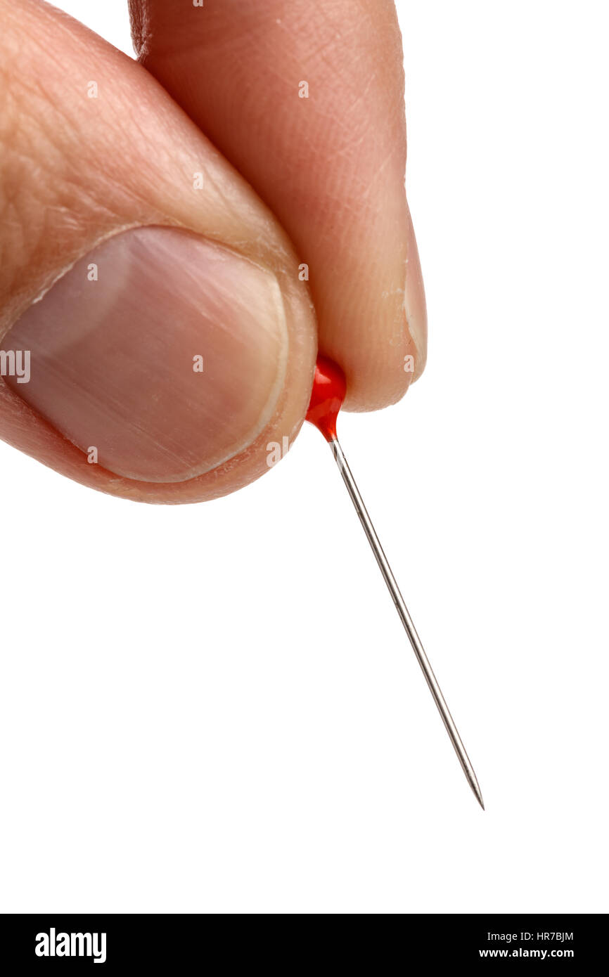 hand holding a pin with a red head, white background Stock Photo - Alamy