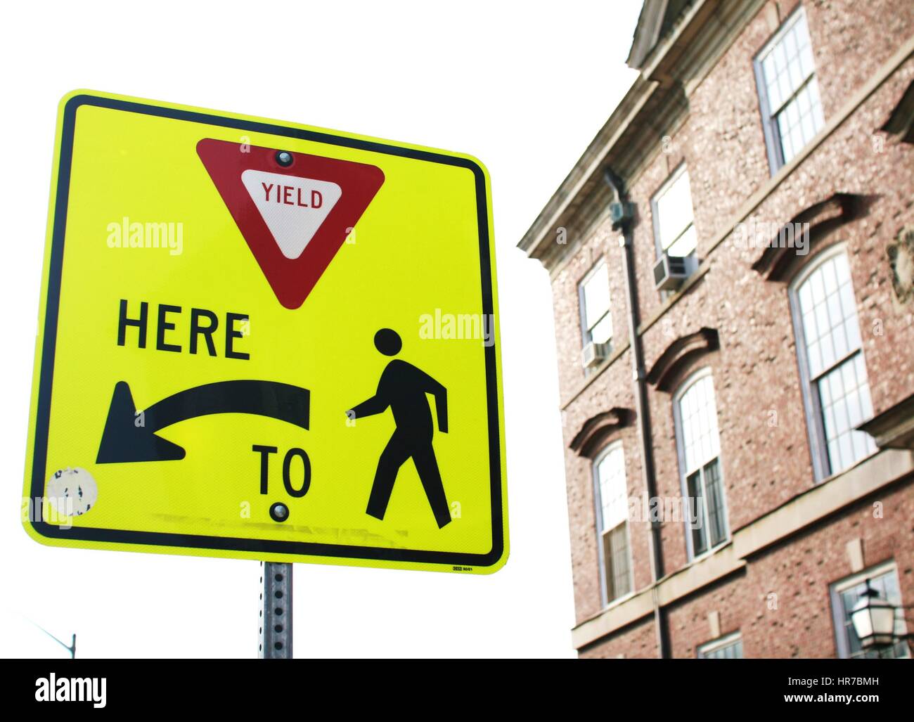 Yield to pedestrian sign hi-res stock photography and images - Alamy