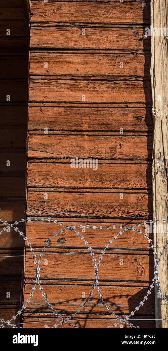 barbed wire fence used for protection purposes of a pproperty Stock ...